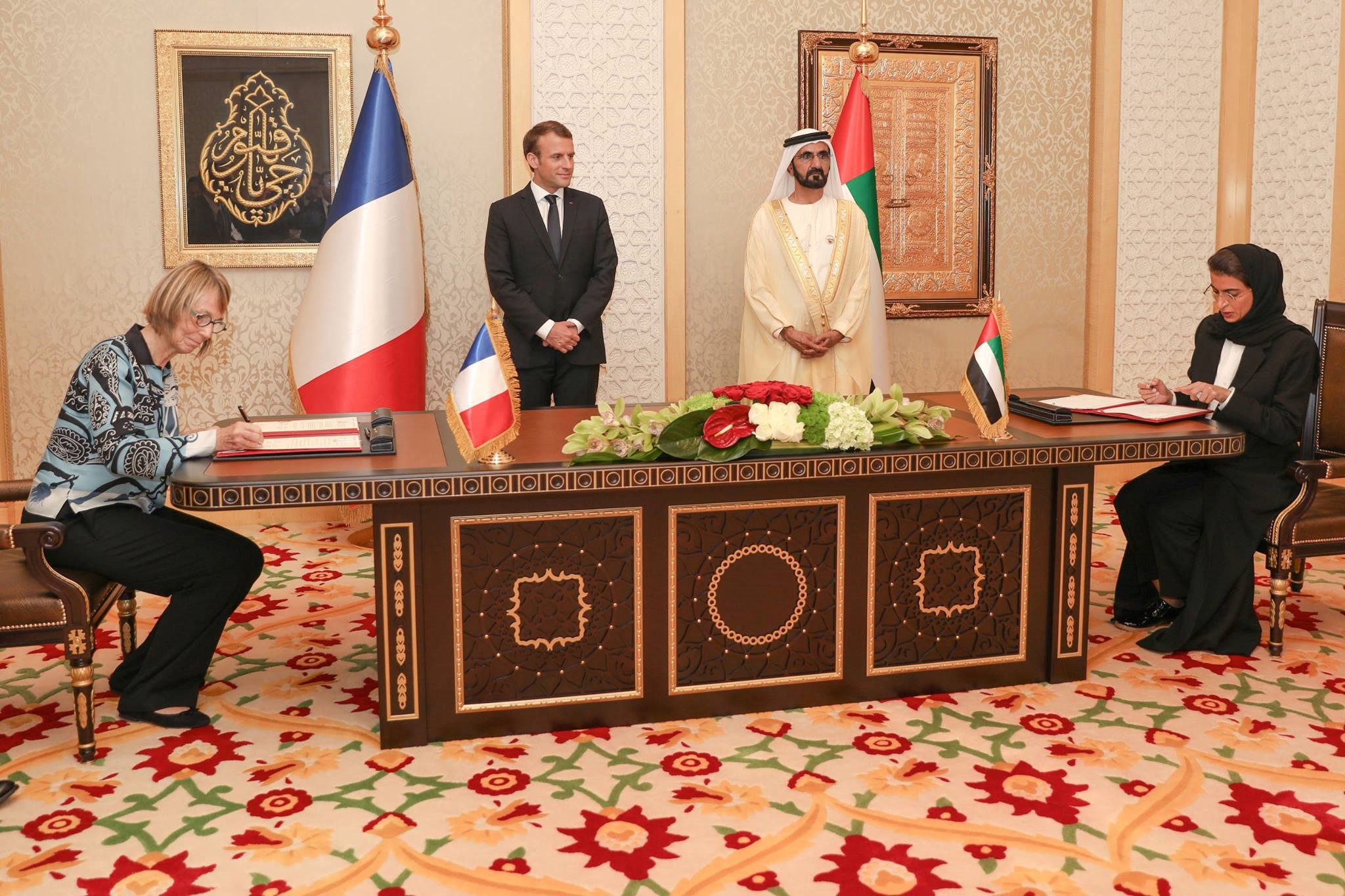 French and Emirati ministers of Culture signing cooperation agreements ...